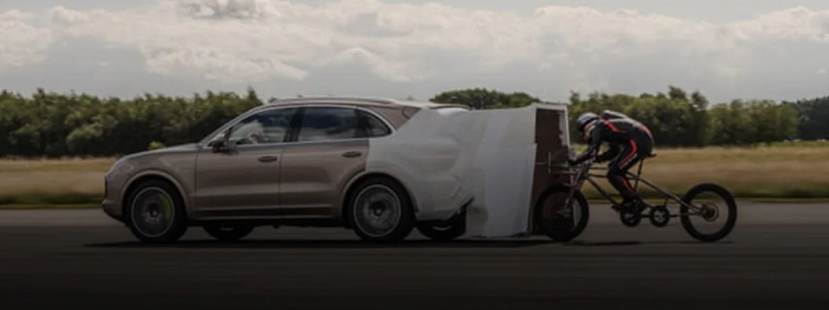Neil Campbell Hits New Speed Cycling Record From The Back of a Porsche ...